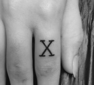 X Tattoo Meaning - Symbolism and History